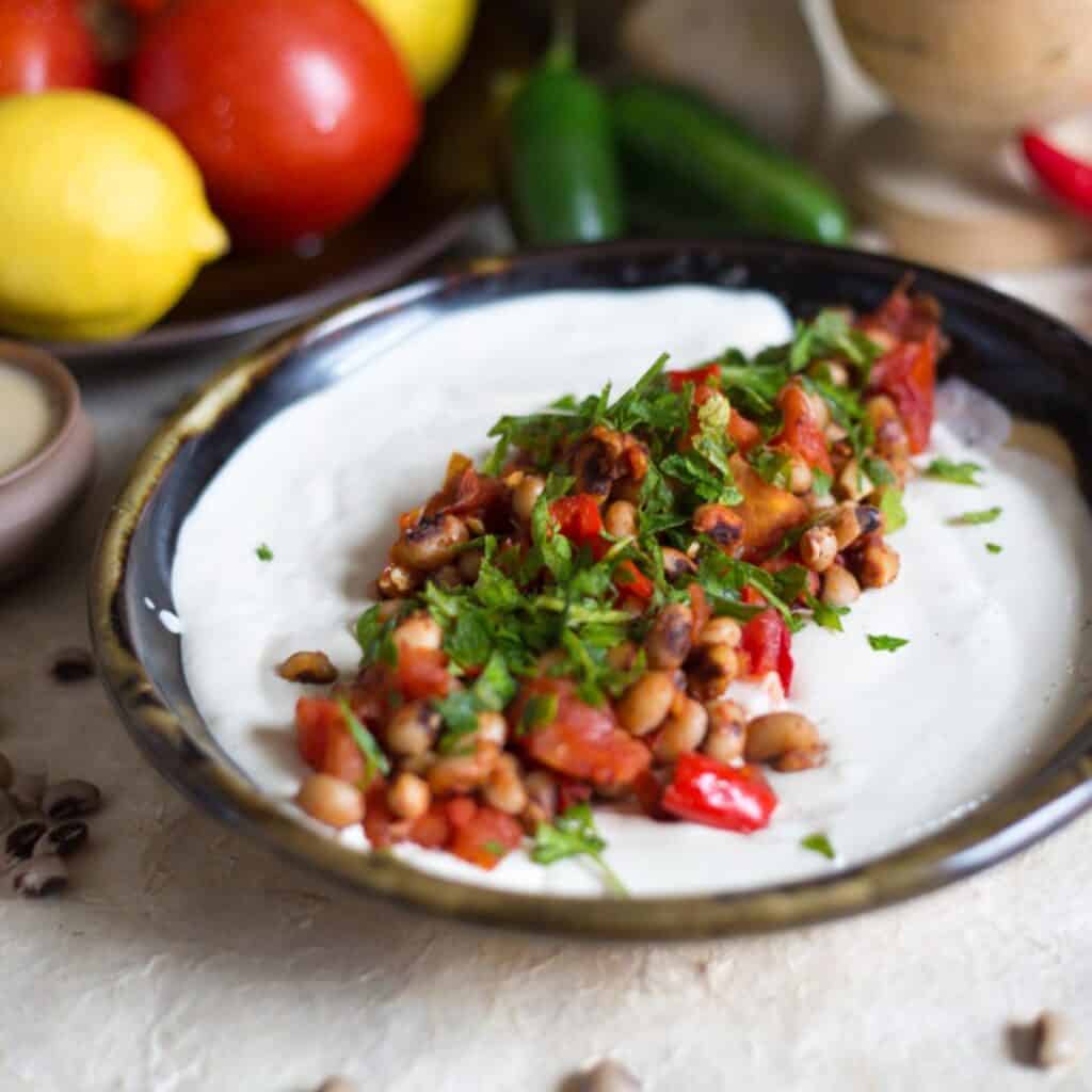 Easy Black-Eyed Pea Dip Recipe with Tahini, Tomatoes, and Garlic